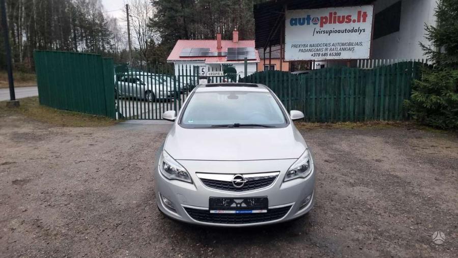 Grey Opel Astra 2010 in Vilnius, with an engine capacity of 1.60 L and mileage of 142 thousand km for 4999 €, photo 34 on AUTOMOTO.COM.LV