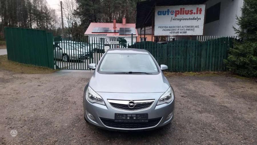 Grey Opel Astra 2010 in Vilnius, with an engine capacity of 1.60 L and mileage of 142 thousand km for 4999 €, photo 39 on AUTOMOTO.COM.LV