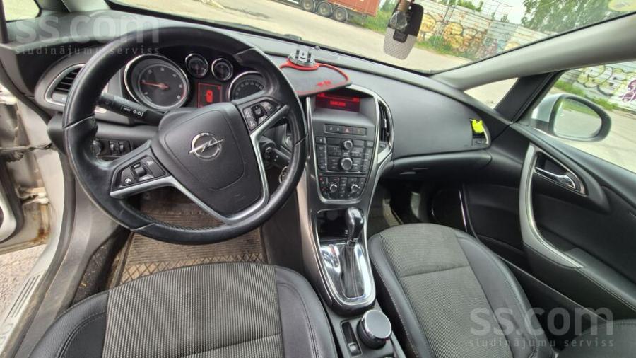 Grey Opel Astra 2010 in Riga, with an engine capacity of 2.00 L and mileage of 250 thousand km for 3900 €, photo 9 on AUTOMOTO.COM.LV