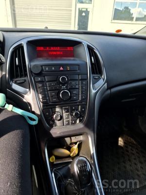 Grey Opel Astra 2010 in Riga, with an engine capacity of 1.70 L and mileage of 302 thousand km for 2500 €, photo 14 on AUTOMOTO.COM.LV