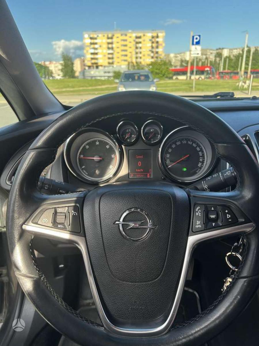 Grey Opel Astra 2010 in Vilnius, with an engine capacity of 2.00 L and mileage of 3 thousand km for 3000 €, photo 11 on AUTOMOTO.COM.LV
