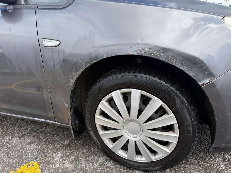 Pelēks Opel Astra 2011 Viļņa, ar dzinēja tilpumu 1.69 L un nobraukumu 400 tūkst. km par 890 €, foto 9 vietnē AUTOMOTO.COM.LV