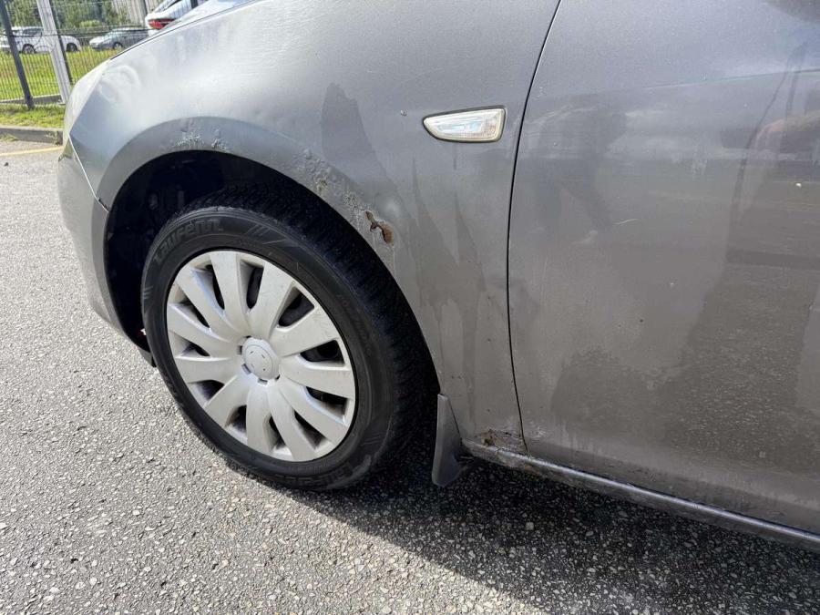 Pelēks Opel Astra 2011 Viļņa, ar dzinēja tilpumu 1.69 L un nobraukumu 400 tūkst. km par 890 €, foto 13 vietnē AUTOMOTO.COM.LV