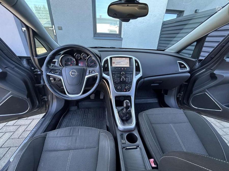 Grey Opel Astra 2011 in Kaunas, with an engine capacity of 1.69 L and mileage of 265 thousand km for 1999 €, photo 6 on AUTOMOTO.COM.LV