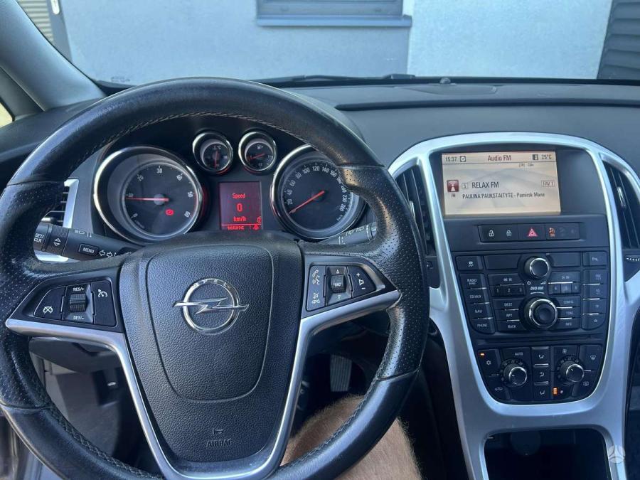 Grey Opel Astra 2011 in Kaunas, with an engine capacity of 1.69 L and mileage of 265 thousand km for 1999 €, photo 7 on AUTOMOTO.COM.LV