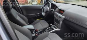 Grey Opel Astra 2011 in Riga, with an engine capacity of 1.40 L and mileage of 161 thousand km for 2800 €, photo 6 on AUTOMOTO.COM.LV