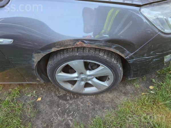 Pelēks Opel Astra 2011 Rīga, ar dzinēja tilpumu 1.60 L un nobraukumu 216 tūkst. km par 650 €, foto 8 vietnē AUTOMOTO.COM.LV