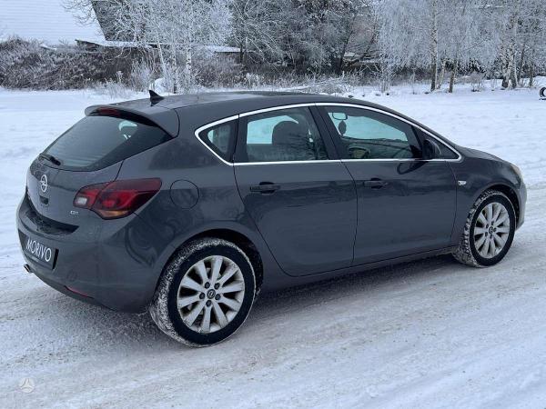 Grey Opel Astra 2012 in Siauliai, with an engine capacity of 1.96 L and mileage of 225 thousand km for 3500 €, photo 6 on AUTOMOTO.COM.LV