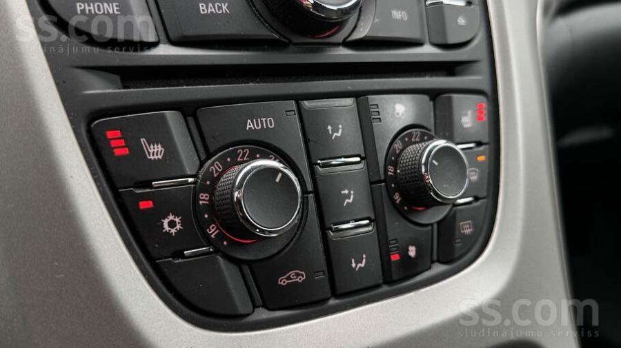 Grey Opel Astra 2012 in Riga, with an engine capacity of 1.40 L and mileage of 283 thousand km for 3950 €, photo 14 on AUTOMOTO.COM.LV