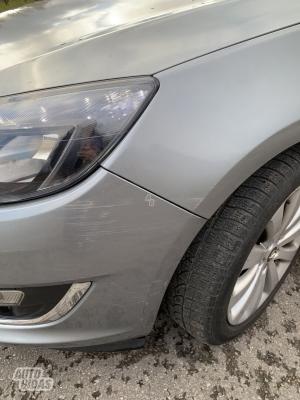 Grey Opel Astra 2013 in Vilnius, with an engine capacity of 1.40 L and mileage of 96 thousand km for 3800 €, photo 11 on AUTOMOTO.COM.LV