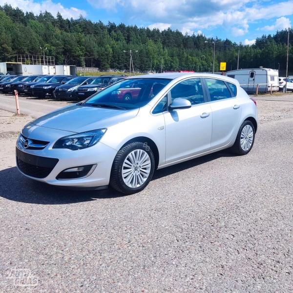 Grey Opel Astra 2013 in Vilnius, with an engine capacity of 1.40 L and mileage of 118 thousand km for 4600 €, photo 1 on AUTOMOTO.COM.LV