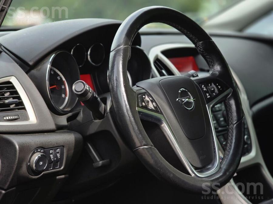 Grey Opel Astra 2013 in Liepaja, with an engine capacity of 1.40 L and mileage of 153 thousand km for 4950 €, photo 11 on AUTOMOTO.COM.LV