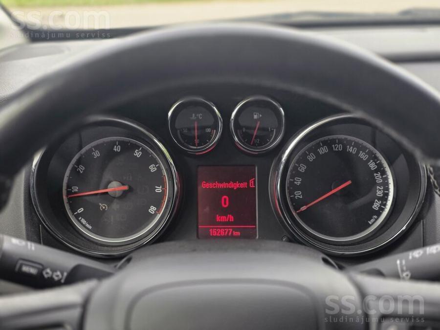 Grey Opel Astra 2013 in Liepaja, with an engine capacity of 1.40 L and mileage of 153 thousand km for 4950 €, photo 15 on AUTOMOTO.COM.LV