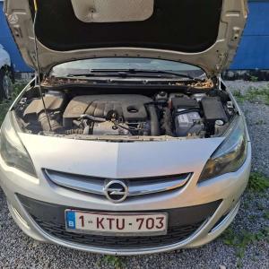 Grey Opel Astra 2015 in Pakruojis, with an engine capacity of 1.60 L and mileage of 240 thousand km for 2950 €, photo 7 on AUTOMOTO.COM.LV