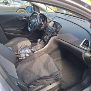 Grey Opel Astra 2015 in Pakruojis, with an engine capacity of 1.60 L and mileage of 240 thousand km for 2950 €, photo 12 on AUTOMOTO.COM.LV