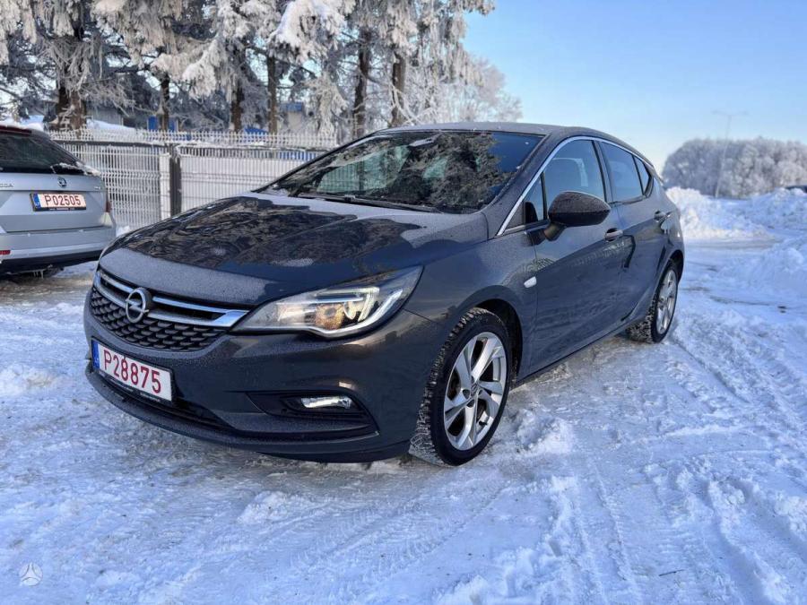 Grey Opel Astra 2016 in Gargzdai, with an engine capacity of 1.60 L and mileage of 188 thousand km for 6999 €, photo 1 on AUTOMOTO.COM.LV