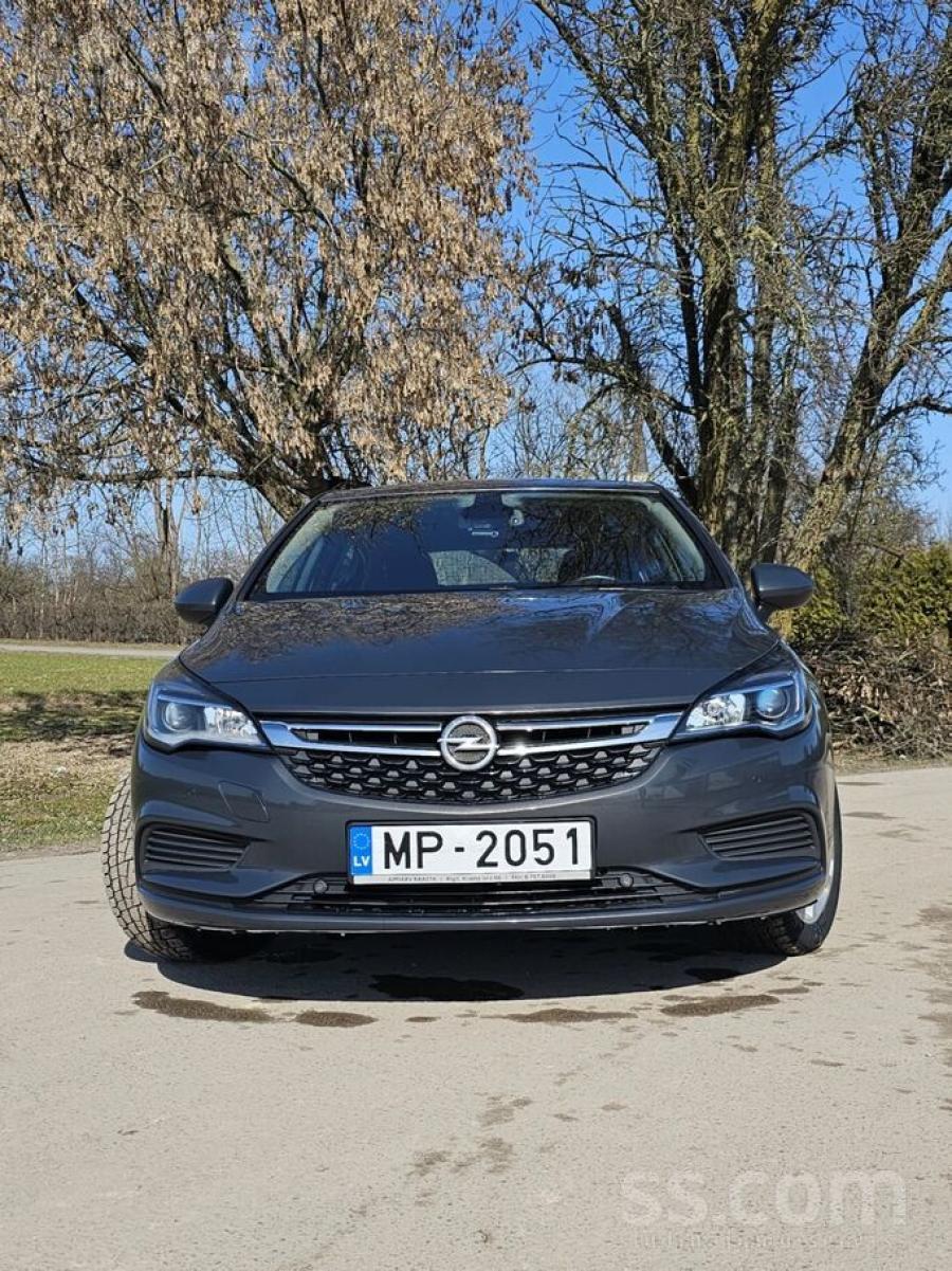 Grey Opel Astra 2016 in Riga, with an engine capacity of 1.60 L and mileage of 204 thousand km for 5199 €, photo 1 on AUTOMOTO.COM.LV