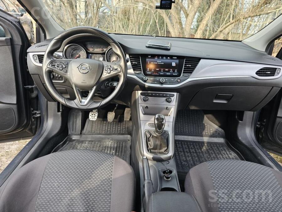 Grey Opel Astra 2016 in Riga, with an engine capacity of 1.60 L and mileage of 204 thousand km for 5199 €, photo 7 on AUTOMOTO.COM.LV