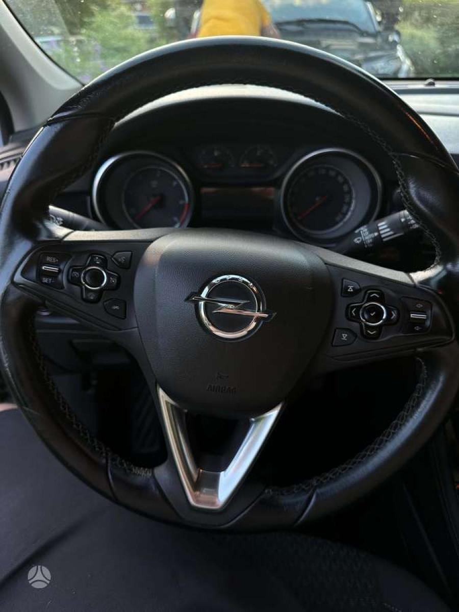 Grey Opel Astra 2016 in Trakai, with an engine capacity of 1.60 L and mileage of 196 thousand km for 5300 €, photo 9 on AUTOMOTO.COM.LV
