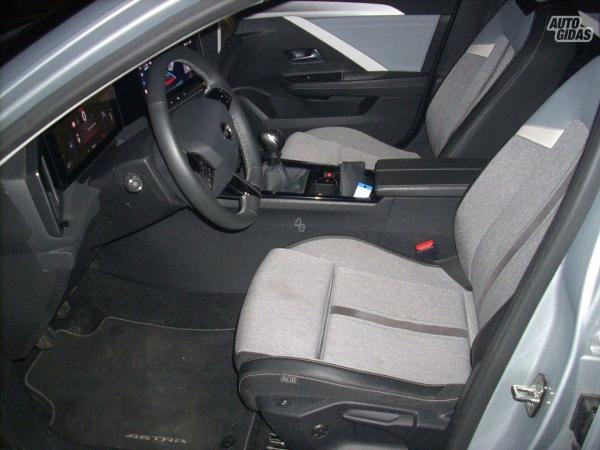 Grey Opel Astra 2022 in Kaunas, with an engine capacity of 1.20 L and mileage of 20 thousand km for 23420 €, photo 8 on AUTOMOTO.COM.LV