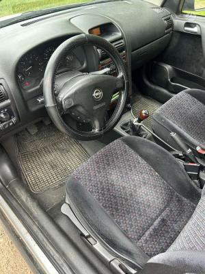 Grey Opel Astra 1999 in Vilnius, with an engine capacity of 1.60 L and mileage of 220 thousand km for 550 €, photo 11 on AUTOMOTO.COM.LV
