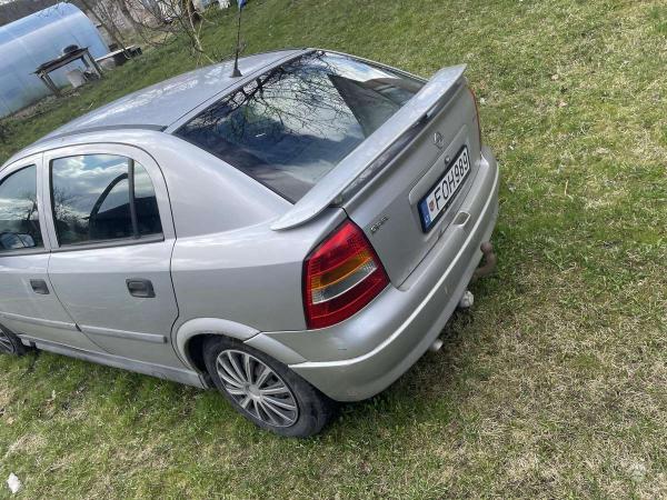 Grey Opel Astra 2000 in Lazdijai, with an engine capacity of 2.00 L and mileage of 250 thousand km for 350 €, photo 3 on AUTOMOTO.COM.LV