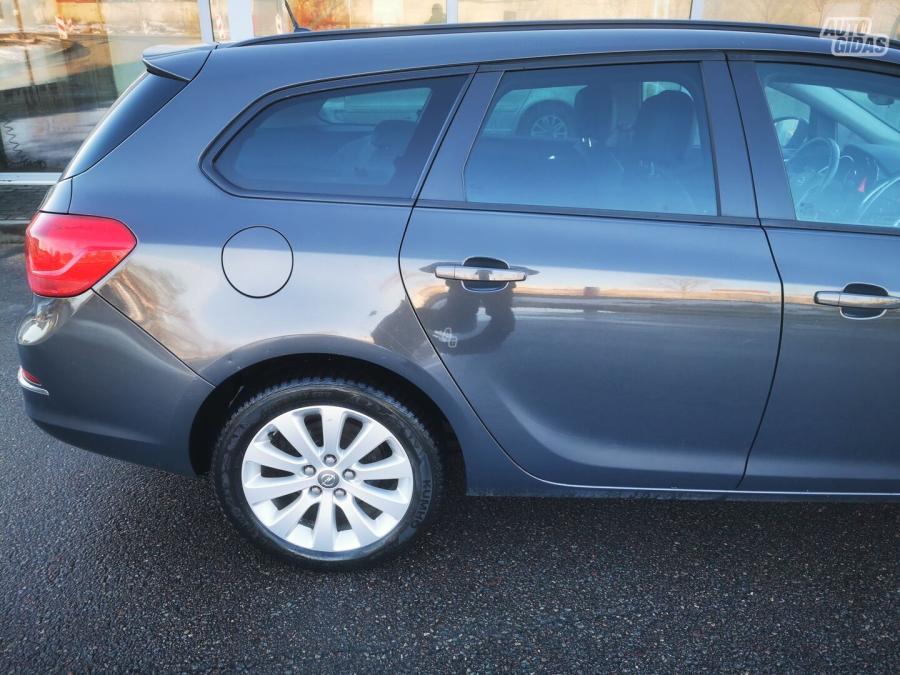 Grey Opel Astra 2014 in Klaipeda, with an engine capacity of 1.70 L and mileage of 197 thousand km for 4490 €, photo 13 on AUTOMOTO.COM.LV