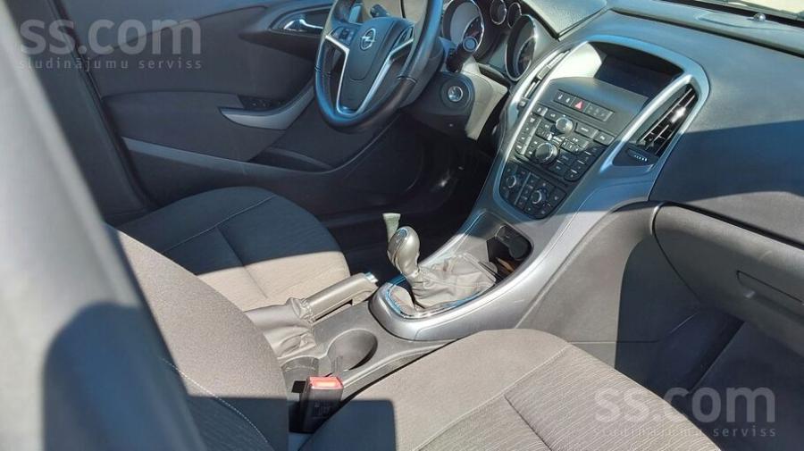Grey Opel Astra 2016 in Riga, with an engine capacity of 1.40 L and mileage of 88 thousand km for 6998 €, photo 11 on AUTOMOTO.COM.LV