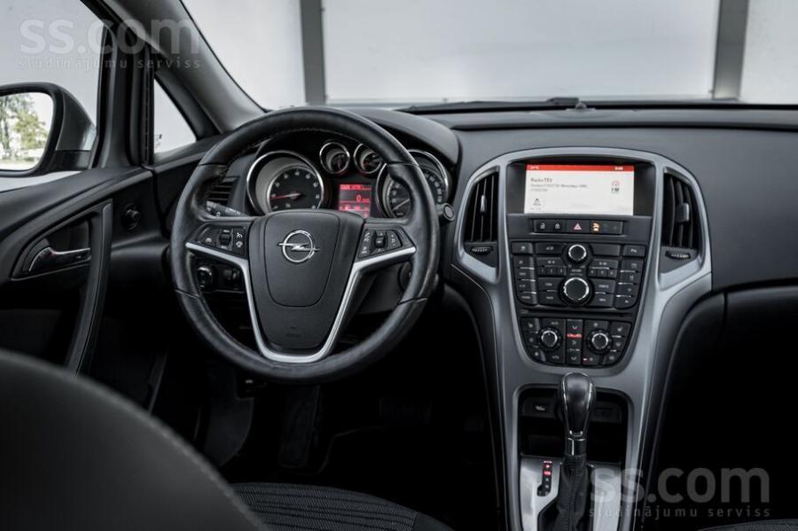 Grey Opel Astra 2017 in Riga, with an engine capacity of 1.40 L and mileage of 79 thousand km for 7990 €, photo 17 on AUTOMOTO.COM.LV
