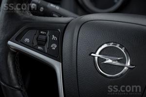 Grey Opel Astra 2017 in Riga, with an engine capacity of 1.40 L and mileage of 79 thousand km for 7990 €, photo 20 on AUTOMOTO.COM.LV