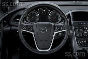 Grey Opel Astra 2017 in Riga, with an engine capacity of 1.40 L and mileage of 79 thousand km for 7990 €, photo 21 on AUTOMOTO.COM.LV