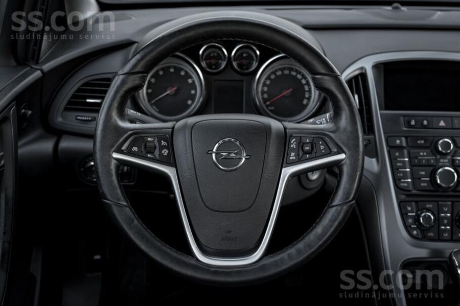 Grey Opel Astra 2017 in Riga, with an engine capacity of 1.40 L and mileage of 79 thousand km for 7990 €, photo 21 on AUTOMOTO.COM.LV