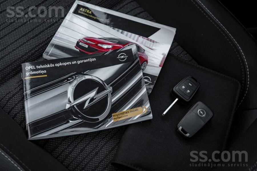 Grey Opel Astra 2017 in Riga, with an engine capacity of 1.40 L and mileage of 79 thousand km for 7990 €, photo 29 on AUTOMOTO.COM.LV