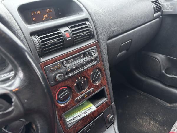 Grey Opel Astra 2000 in Vilnius, with an engine capacity of 1.60 L and mileage of 220 thousand km for 760 €, photo 10 on AUTOMOTO.COM.LV