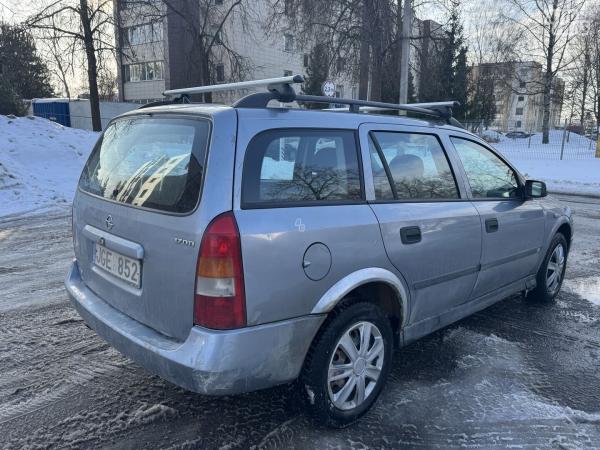 Grey Opel Astra 2003 in Panevezys, with an engine capacity of 1.70 L and mileage of 252 thousand km for 400 €, photo 6 on AUTOMOTO.COM.LV