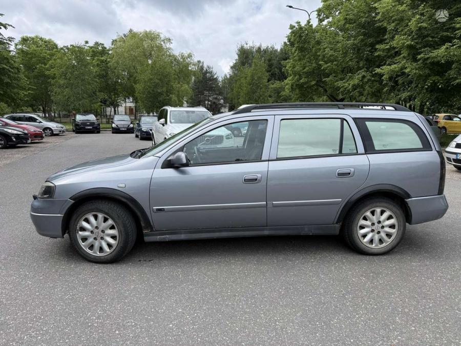 Pelēks Opel Astra 2003 Viļņa, ar dzinēja tilpumu 2.00 L un nobraukumu 275 tūkst. km par 500 €, foto 4 vietnē AUTOMOTO.COM.LV