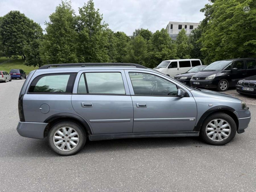 Pelēks Opel Astra 2003 Viļņa, ar dzinēja tilpumu 2.00 L un nobraukumu 275 tūkst. km par 500 €, foto 5 vietnē AUTOMOTO.COM.LV