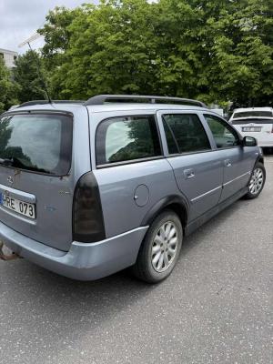 Pelēks Opel Astra 2003 Viļņa, ar dzinēja tilpumu 2.00 L un nobraukumu 275 tūkst. km par 500 €, foto 7 vietnē AUTOMOTO.COM.LV