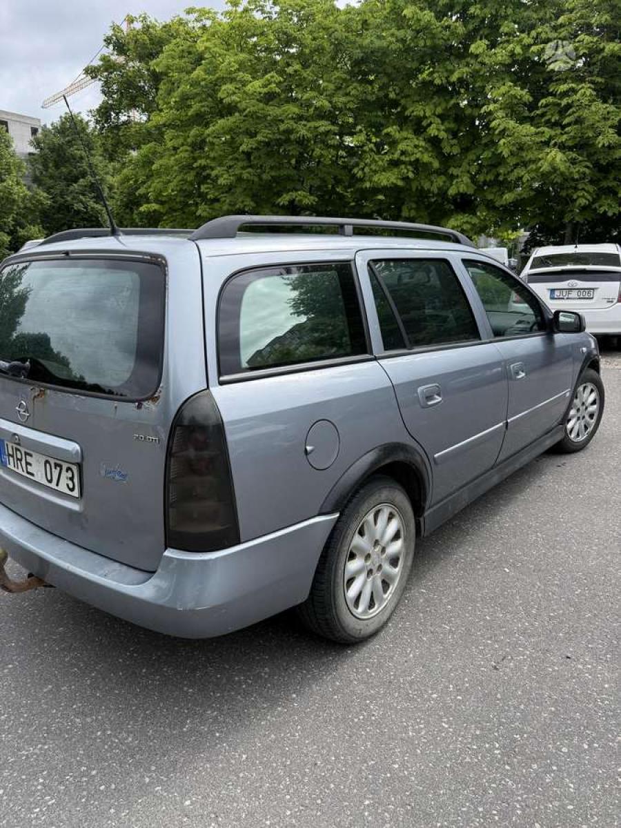 Pelēks Opel Astra 2003 Viļņa, ar dzinēja tilpumu 2.00 L un nobraukumu 275 tūkst. km par 500 €, foto 7 vietnē AUTOMOTO.COM.LV