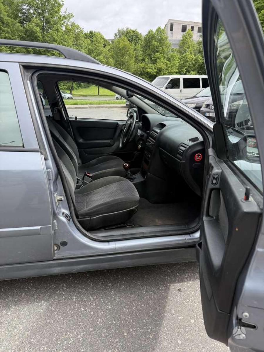 Pelēks Opel Astra 2003 Viļņa, ar dzinēja tilpumu 2.00 L un nobraukumu 275 tūkst. km par 500 €, foto 12 vietnē AUTOMOTO.COM.LV