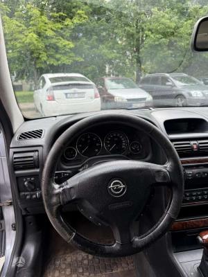 Pelēks Opel Astra 2003 Viļņa, ar dzinēja tilpumu 2.00 L un nobraukumu 275 tūkst. km par 500 €, foto 14 vietnē AUTOMOTO.COM.LV