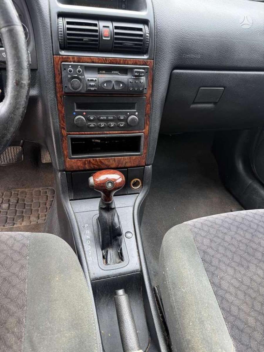 Pelēks Opel Astra 2003 Viļņa, ar dzinēja tilpumu 2.00 L un nobraukumu 275 tūkst. km par 500 €, foto 15 vietnē AUTOMOTO.COM.LV