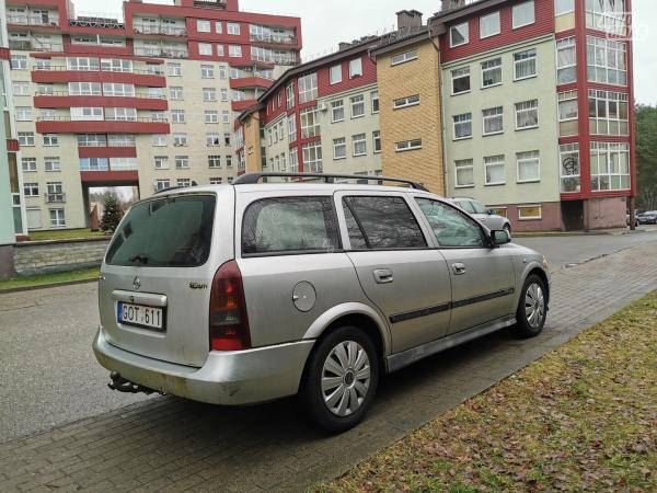Pelēks Opel Astra 2004 Viļņa, ar dzinēja tilpumu 2.00 L un nobraukumu 300 tūkst. km par 350 €, foto 5 vietnē AUTOMOTO.COM.LV