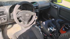 Pelēks Opel Astra 2004 Rīga, ar dzinēja tilpumu 1.70 L un nobraukumu 327 tūkst. km par 450 €, foto 6 vietnē AUTOMOTO.COM.LV