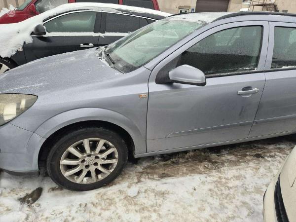 Pelēks Opel Astra 2005 Kauņa, ar dzinēja tilpumu 1.80 L un nobraukumu 180 tūkst. km par 600 €, foto 4 vietnē AUTOMOTO.COM.LV