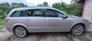 Pelēks Opel Astra 2005 Valmiera, ar dzinēja tilpumu 1.80 L un nobraukumu 300 tūkst. km par 1000 €, foto 5 vietnē AUTOMOTO.COM.LV