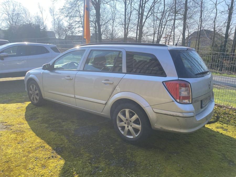 Grey Opel Astra 2007 in Marijampole, with an engine capacity of 1.60 L and mileage of 260 thousand km for 1350 €, photo 8 on AUTOMOTO.COM.LV