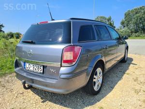 Pelēks Opel Astra 2007 Rīga, ar dzinēja tilpumu 1.90 L un nobraukumu 293 tūkst. km par 1990 €, foto 5 vietnē AUTOMOTO.COM.LV