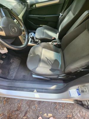 Grey Opel Astra 2007 in Riga, with an engine capacity of 1.70 L and mileage of 310 thousand km for 1600 €, photo 11 on AUTOMOTO.COM.LV