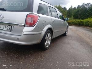 Grey Opel Astra 2007 in Dobele, with an engine capacity of 1.90 L and mileage of 328 thousand km for 1300 €, photo 7 on AUTOMOTO.COM.LV